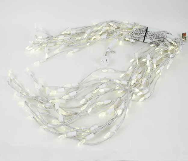 Warm White LED Icicle Lights on White Wire - Novelty Lights Inc Novelty ...