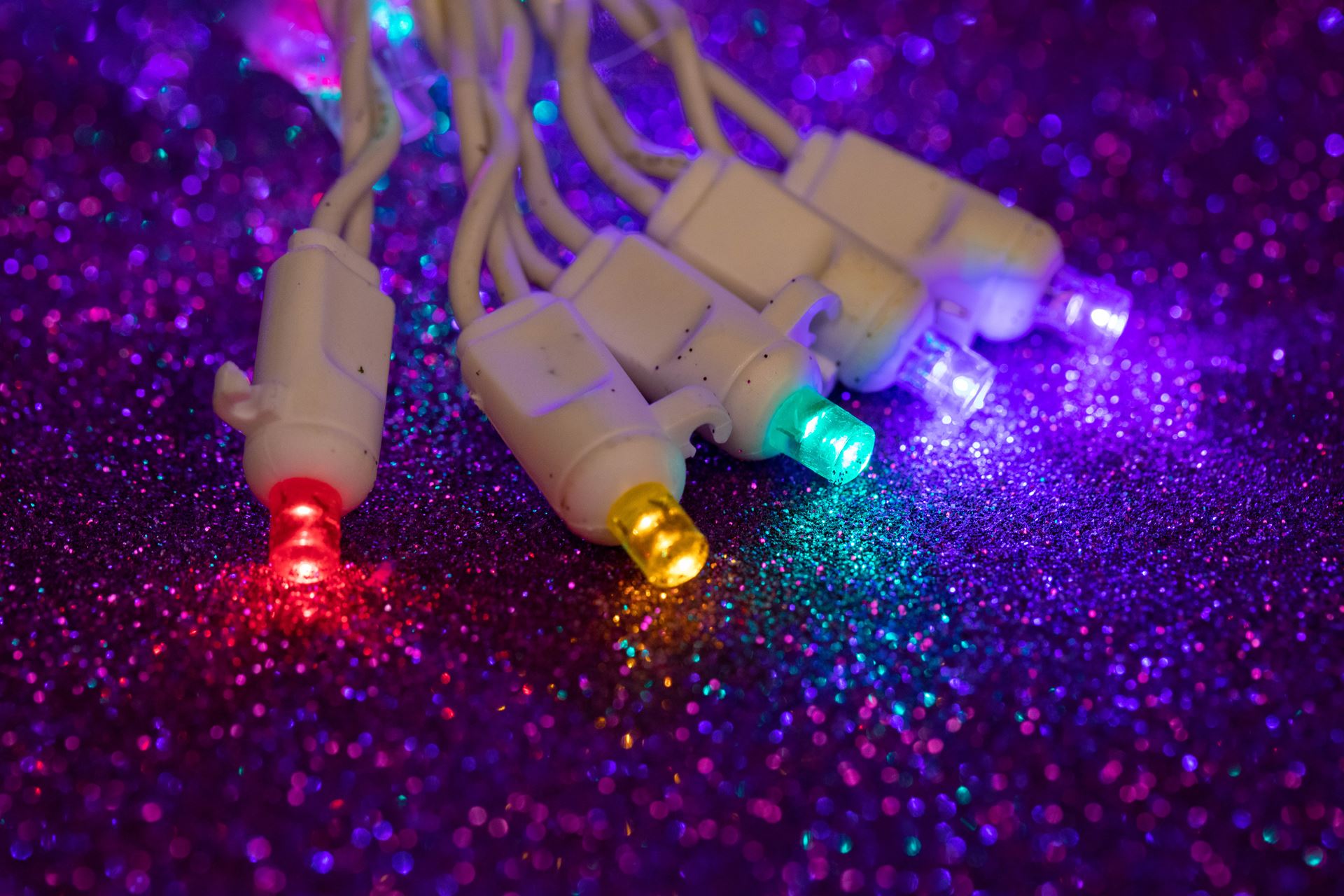 Multi LED Icicle Lights on White Wire - Novelty Lights Inc Novelty ...
