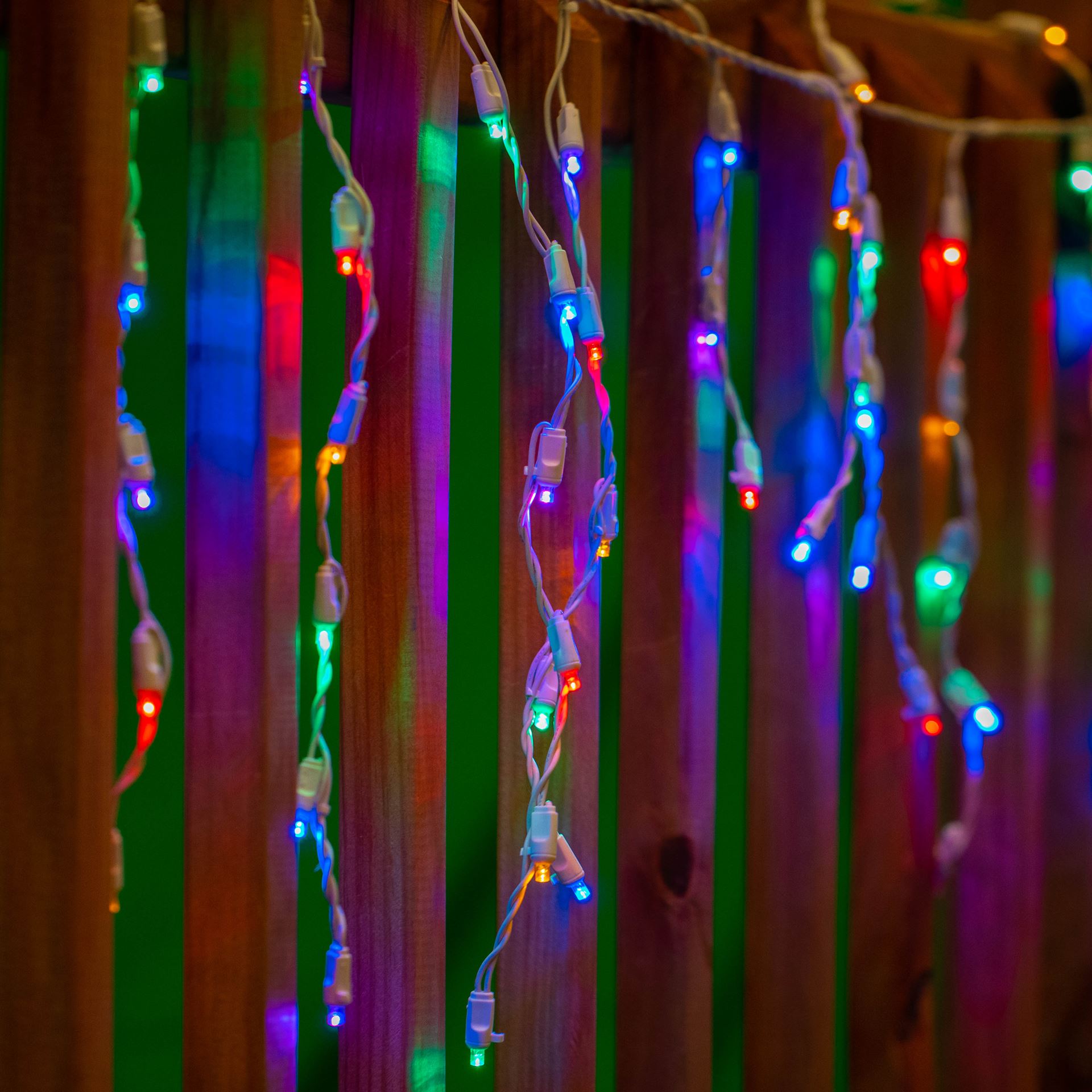 Multi LED Icicle Lights on White Wire - Novelty Lights Inc Novelty ...