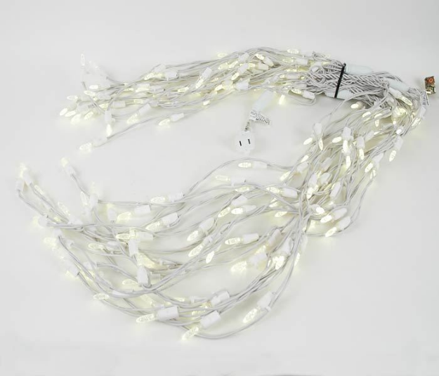 Coaxial Warm White LED Icicle Lights on White Wire - Novelty Lights Inc ...