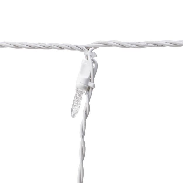 Coaxial Warm White LED Icicle Lights on White Wire - Novelty Lights Inc ...