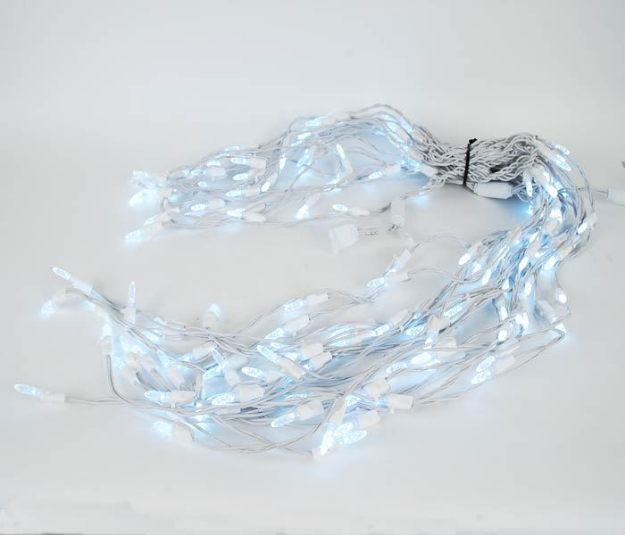 Coaxial Pure White LED Icicle Lights on White Wire - Novelty Lights Inc ...